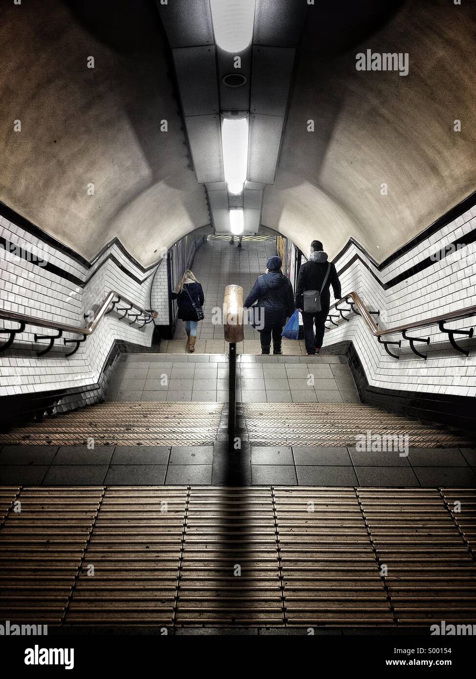 People going underground hi-res stock photography and images - Alamy