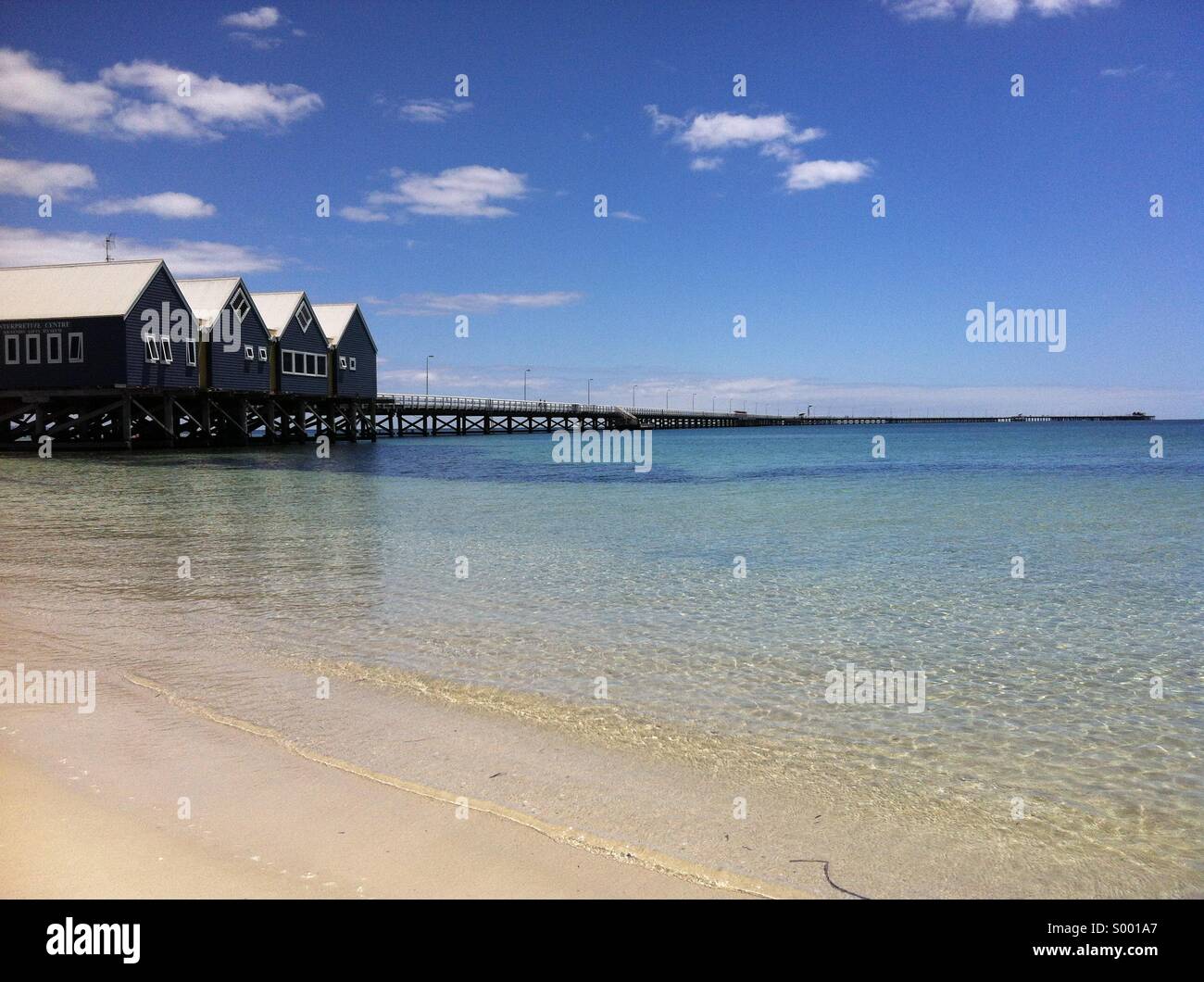 wood jetty and buildings on the ocean Stock Photo - Alamy