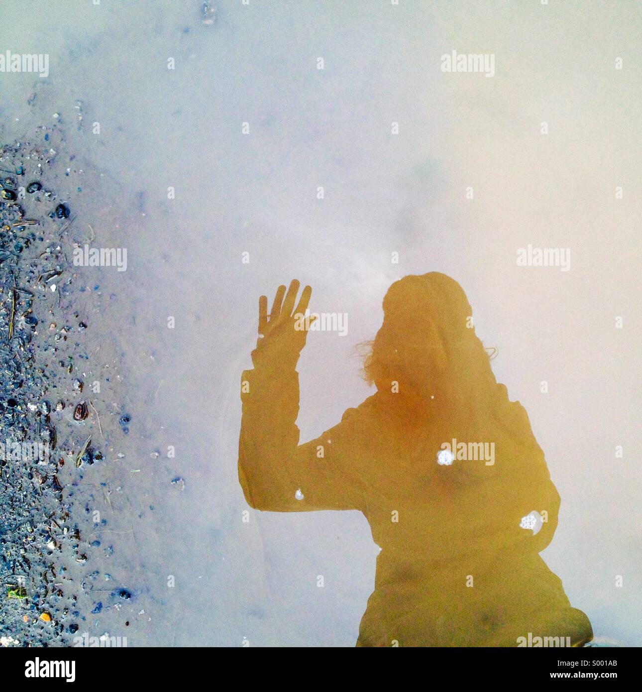 Person in reflection hi-res stock photography and images - Alamy