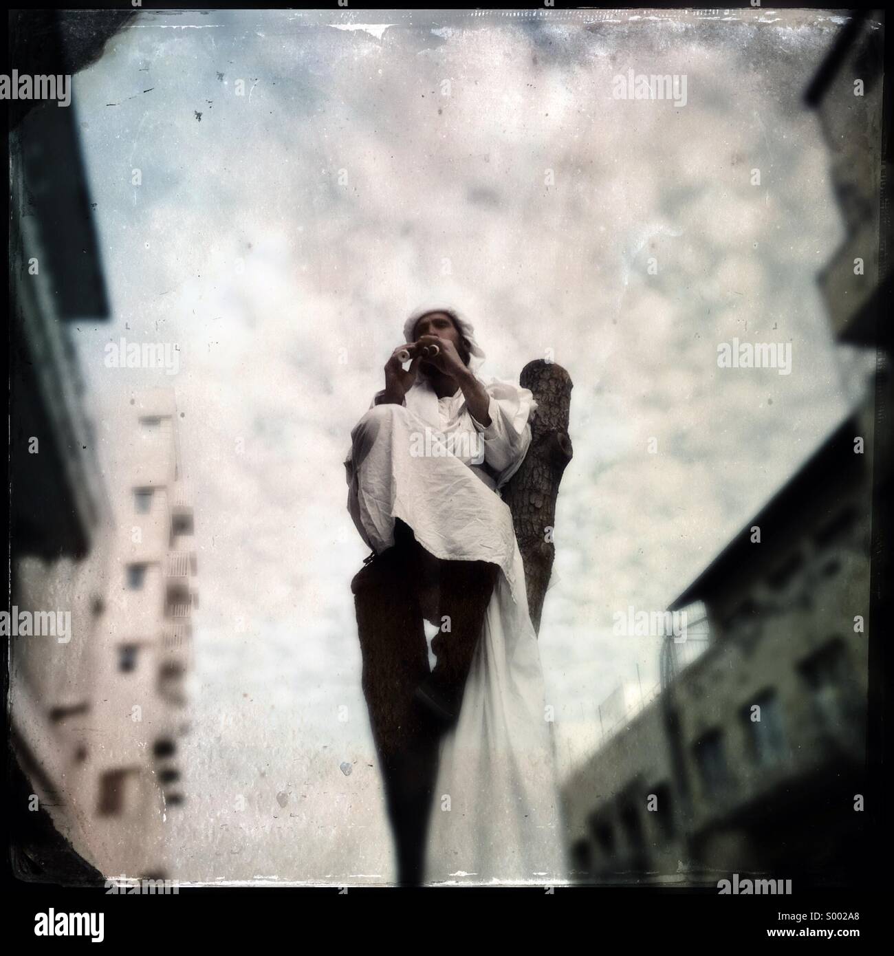 Street musician playing flute hi-res stock photography and images - Alamy