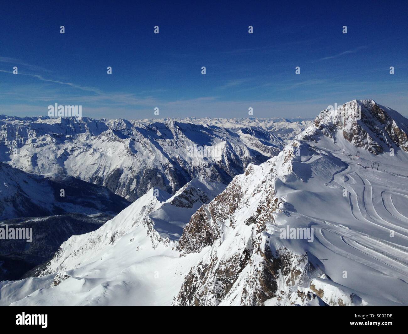 The snow covered Austrian Alps Stock Photo - Alamy