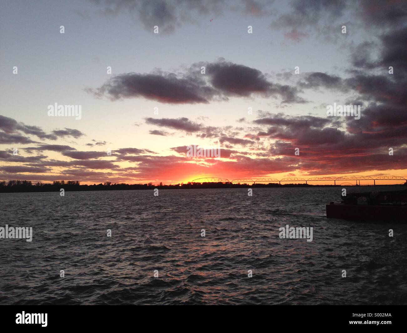 Sunrise over river Stock Photo - Alamy