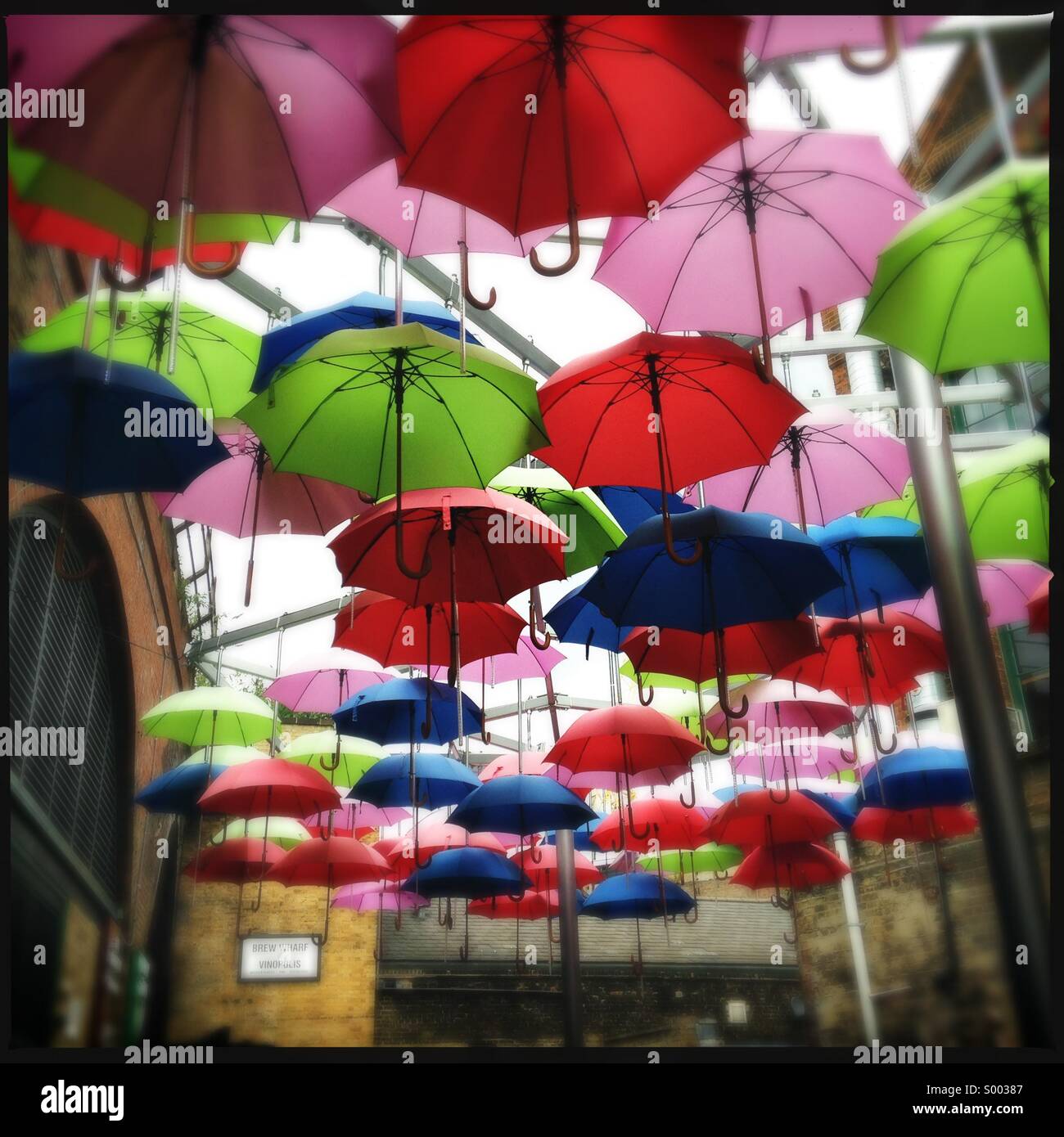 Brightly coloured umbrellas hi-res stock photography and images - Alamy