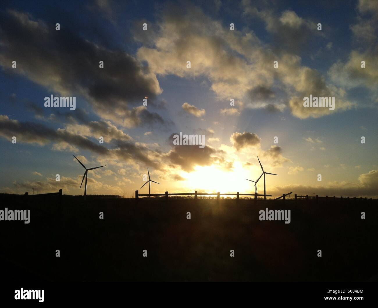 Wind farm in Yorkshire at sunset Stock Photo - Alamy