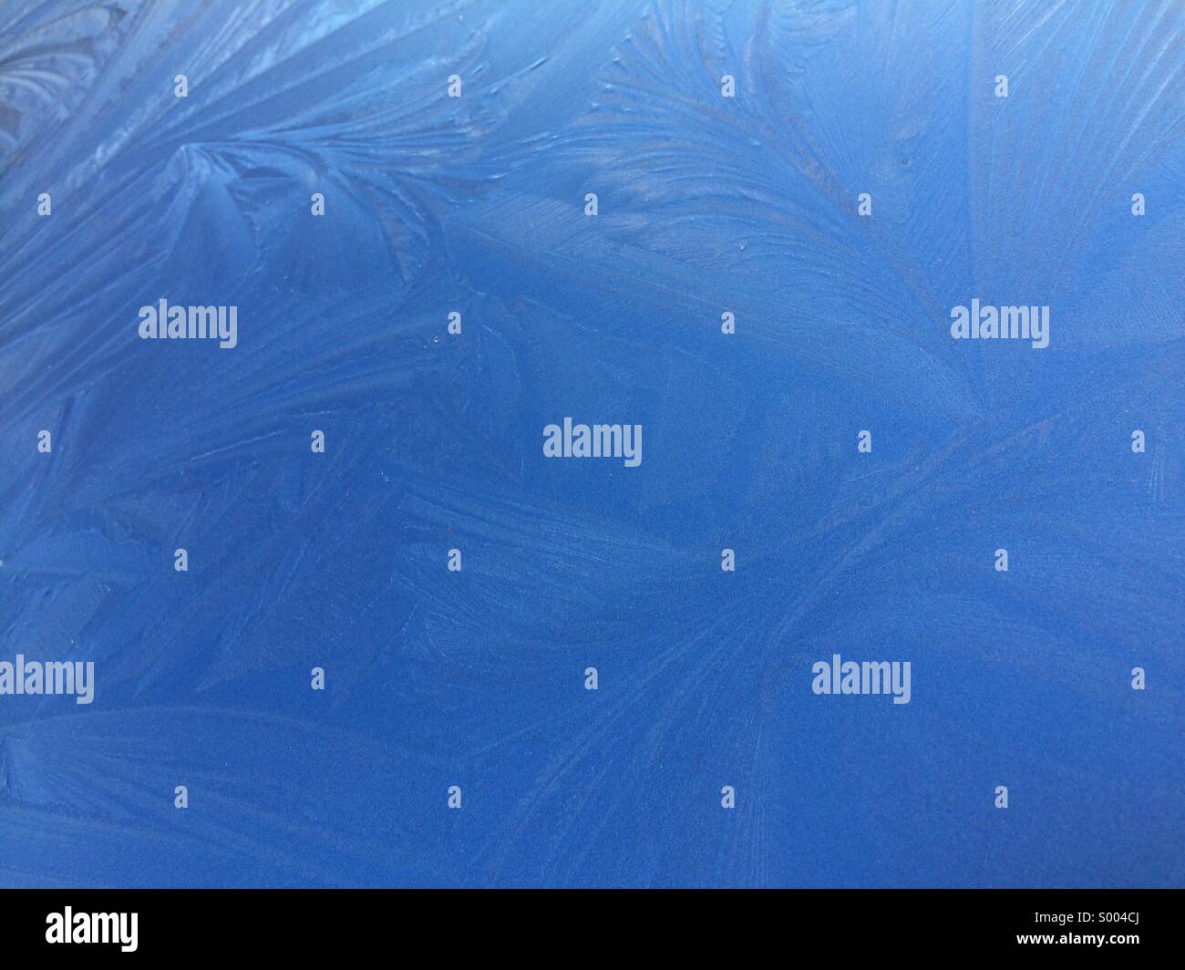 Frost patterns on car window Stock Photo - Alamy