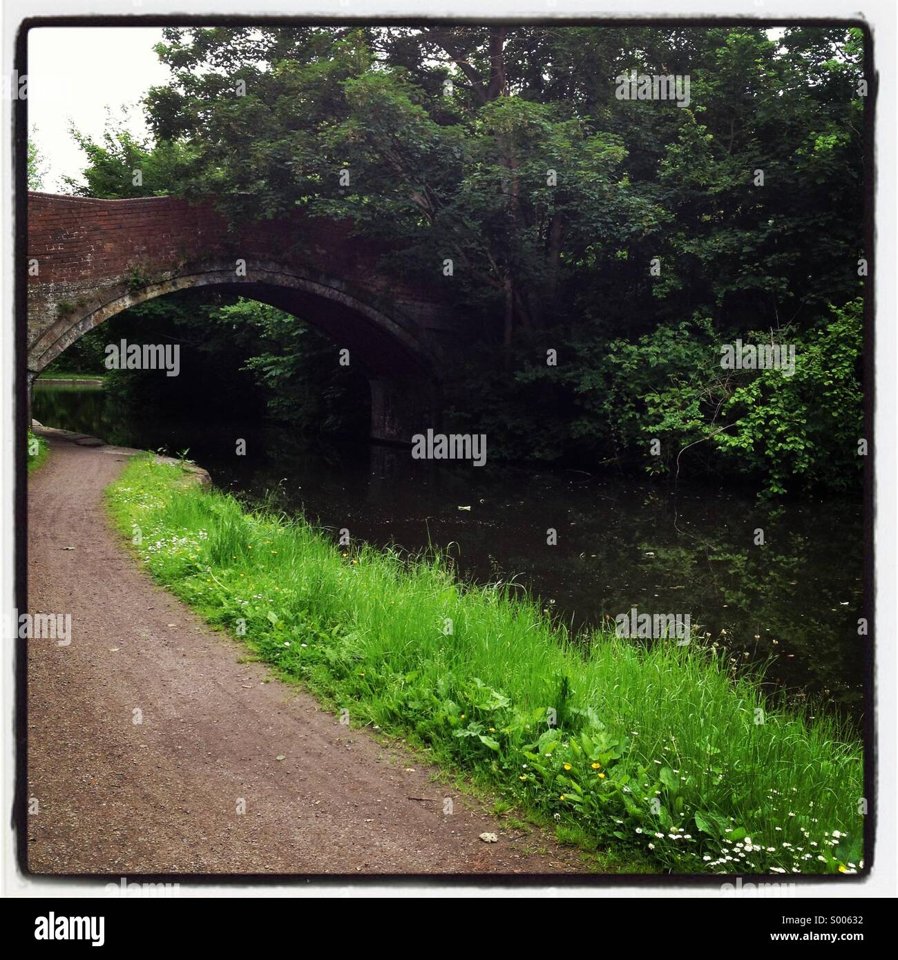 Bridge over canal Stock Photo - Alamy