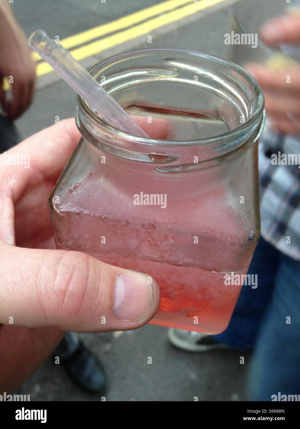 Cocktail in a jam jar Stock Photo - Alamy