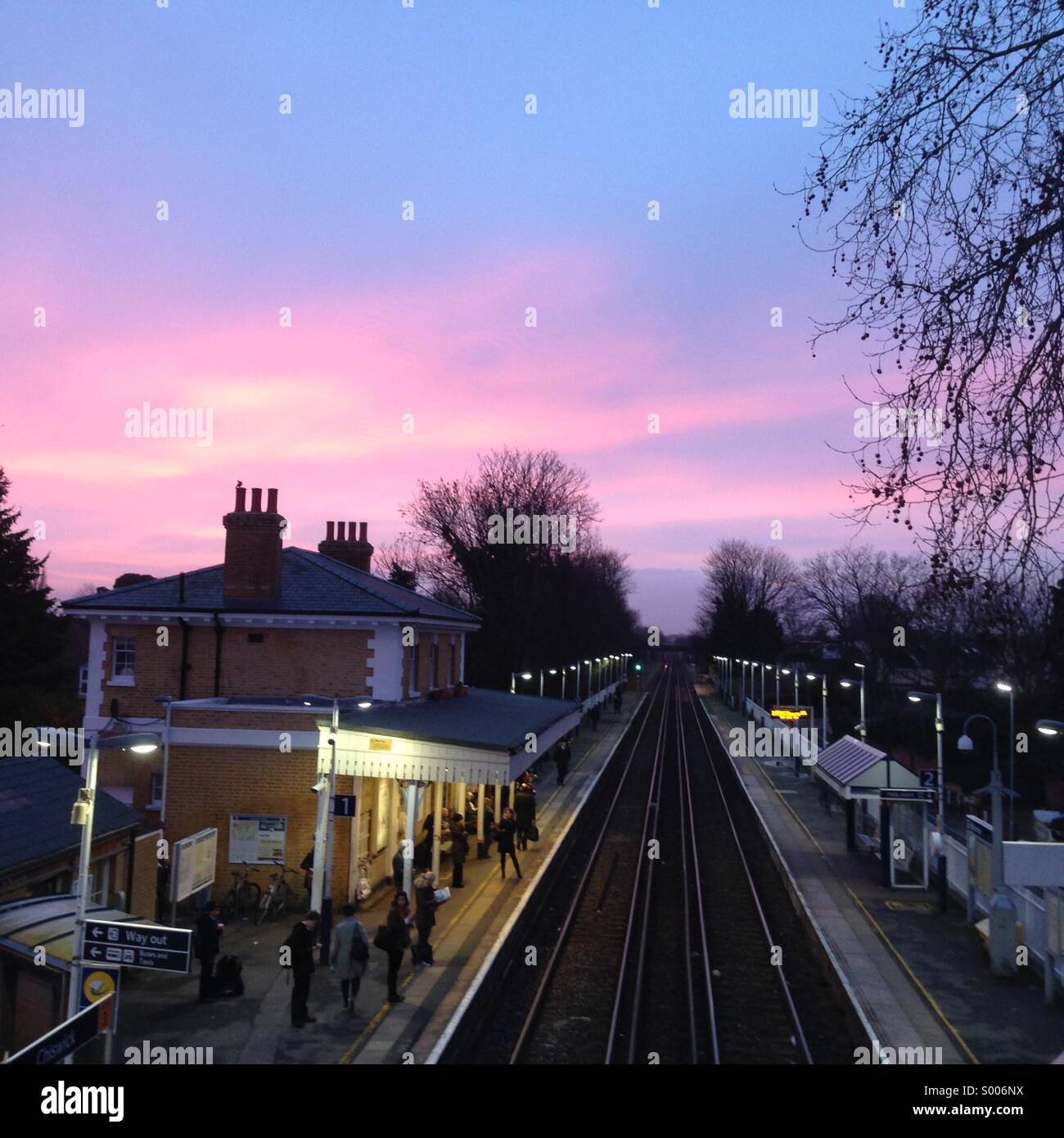 Red sky over Chiswick railway station Stock Photo - Alamy