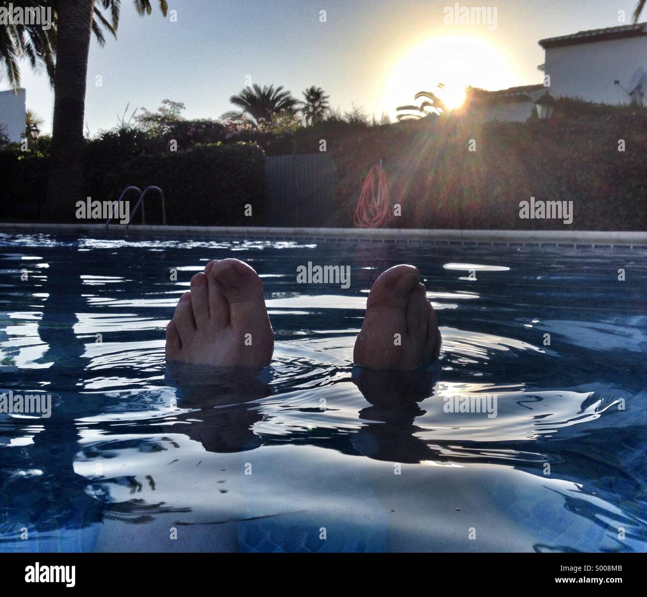 Feet and swimming pool hi-res stock photography and images - Alamy