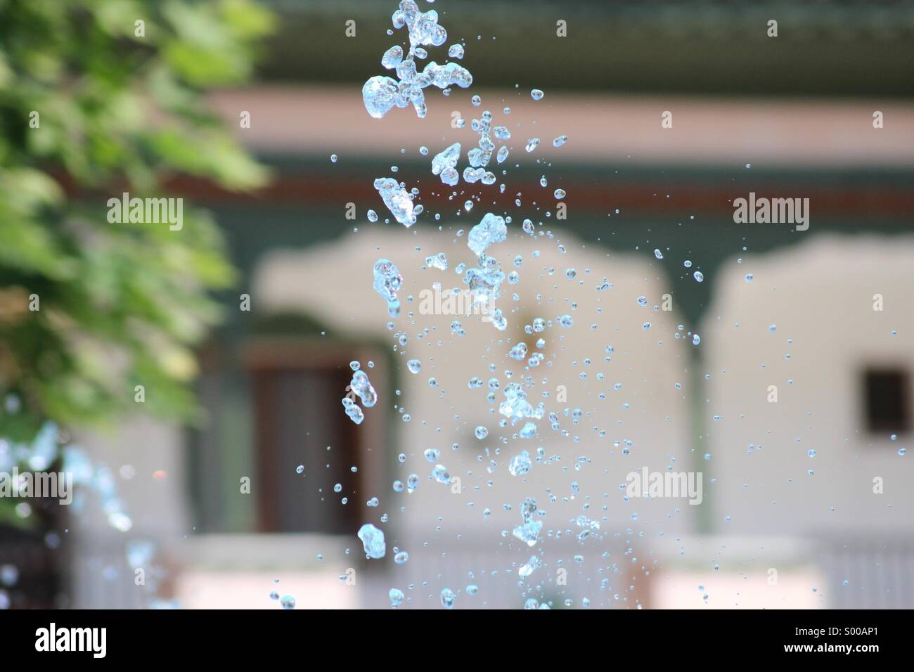 Water droplets flying Stock Photo - Alamy