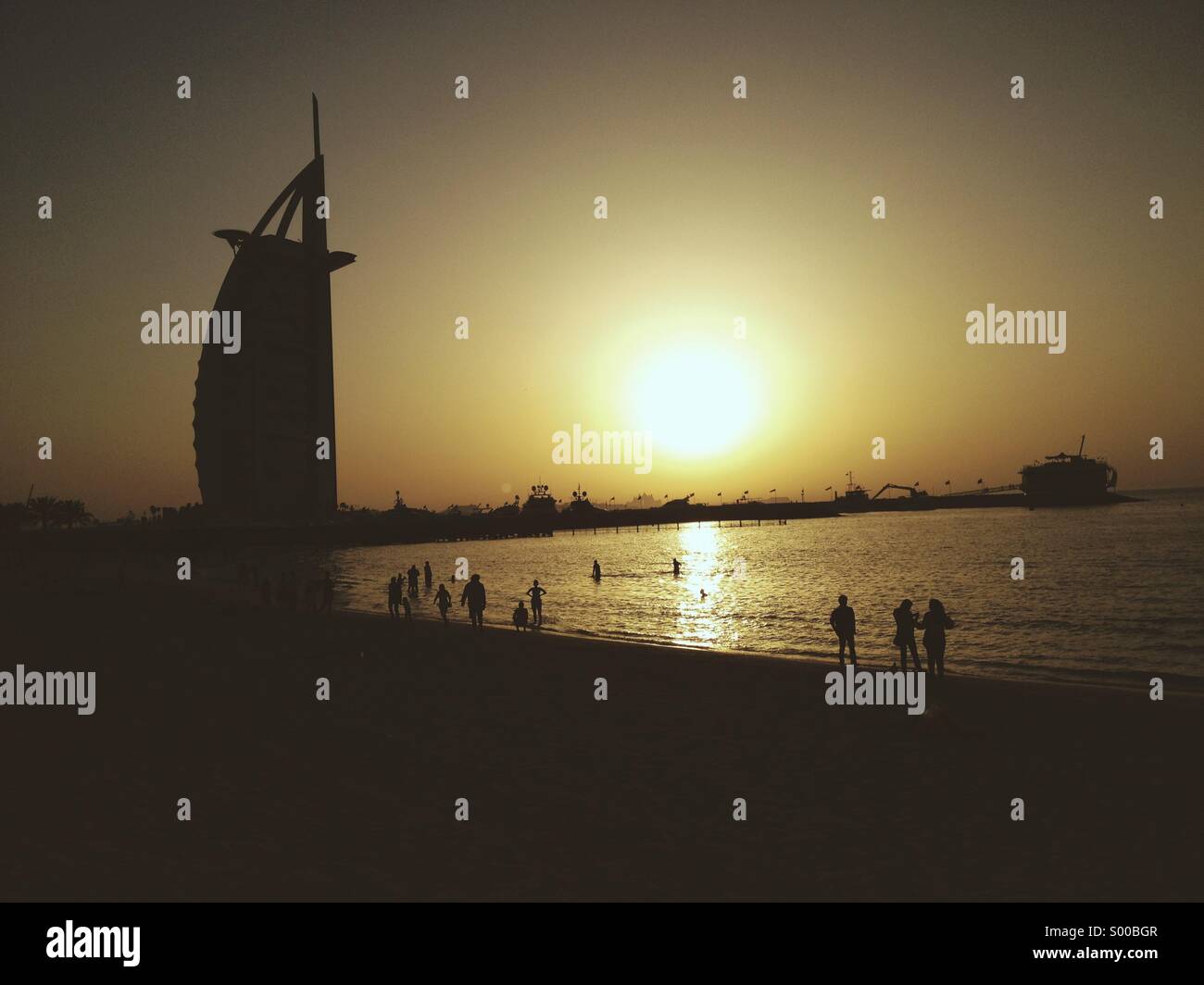 Sunset in Dubai Stock Photo - Alamy