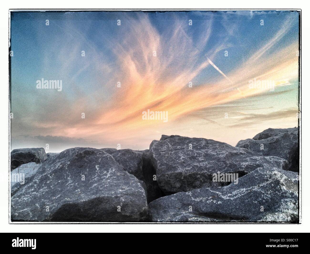 Big grey rocks with amazing sky Stock Photo - Alamy