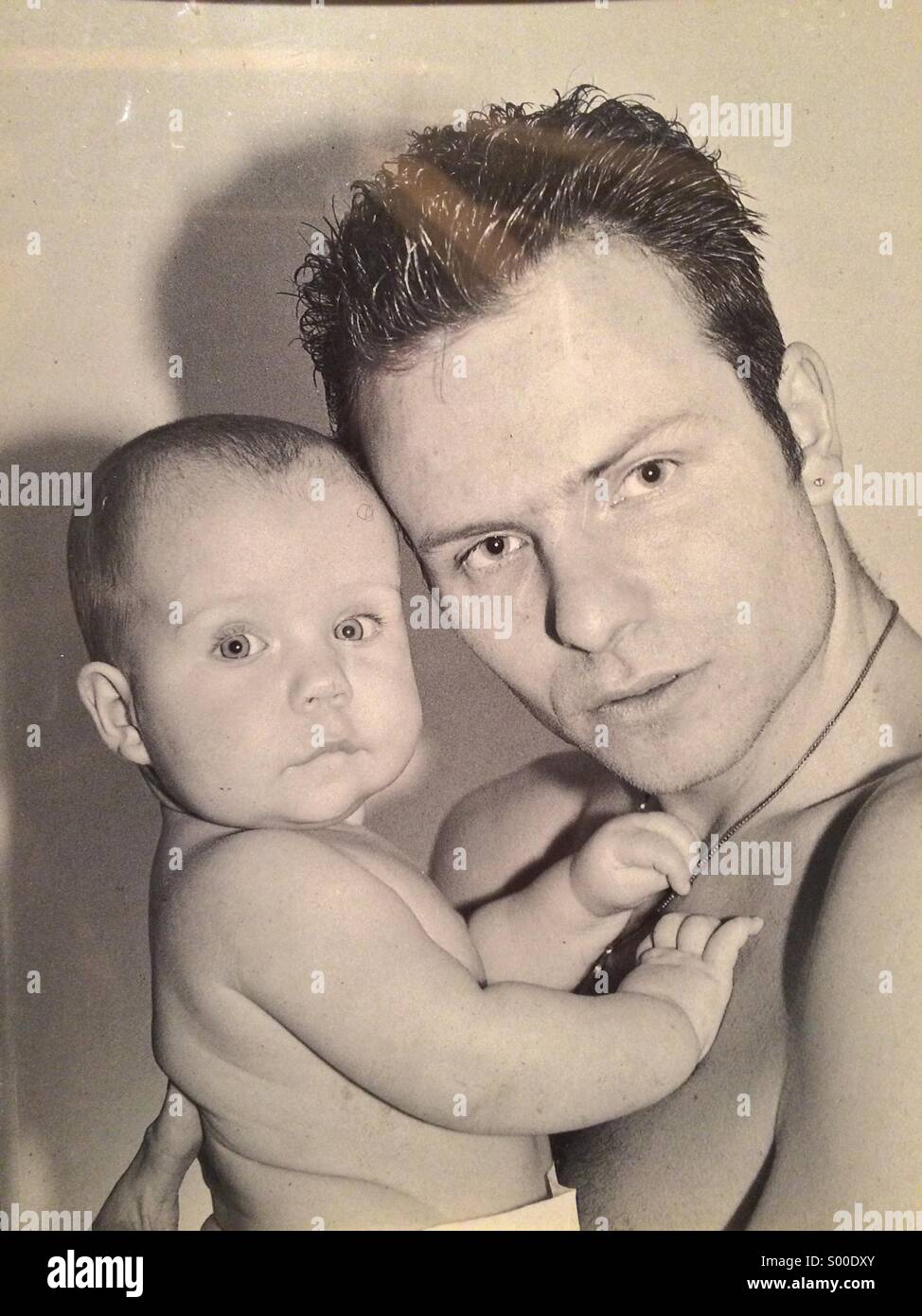 Man and baby hi-res stock photography and images - Alamy