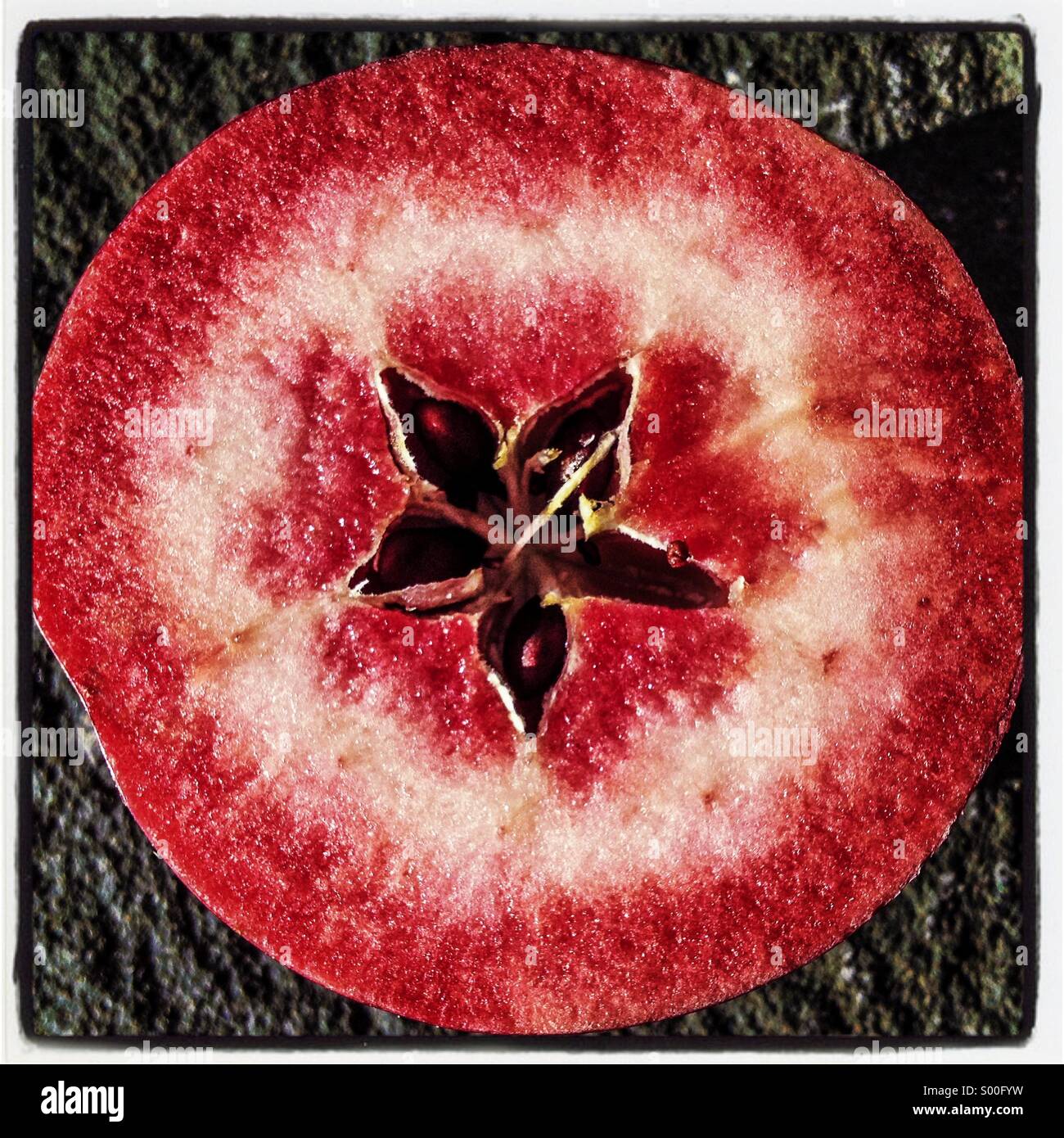 Red sliced apple Stock Photo - Alamy