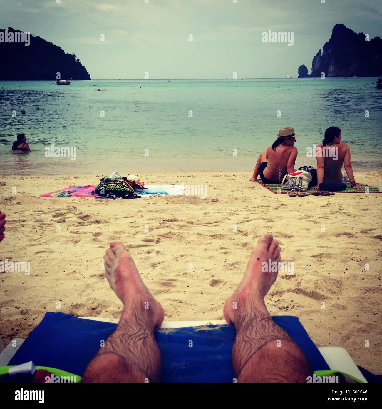 Legs sunbathing hi-res stock photography and images - Alamy