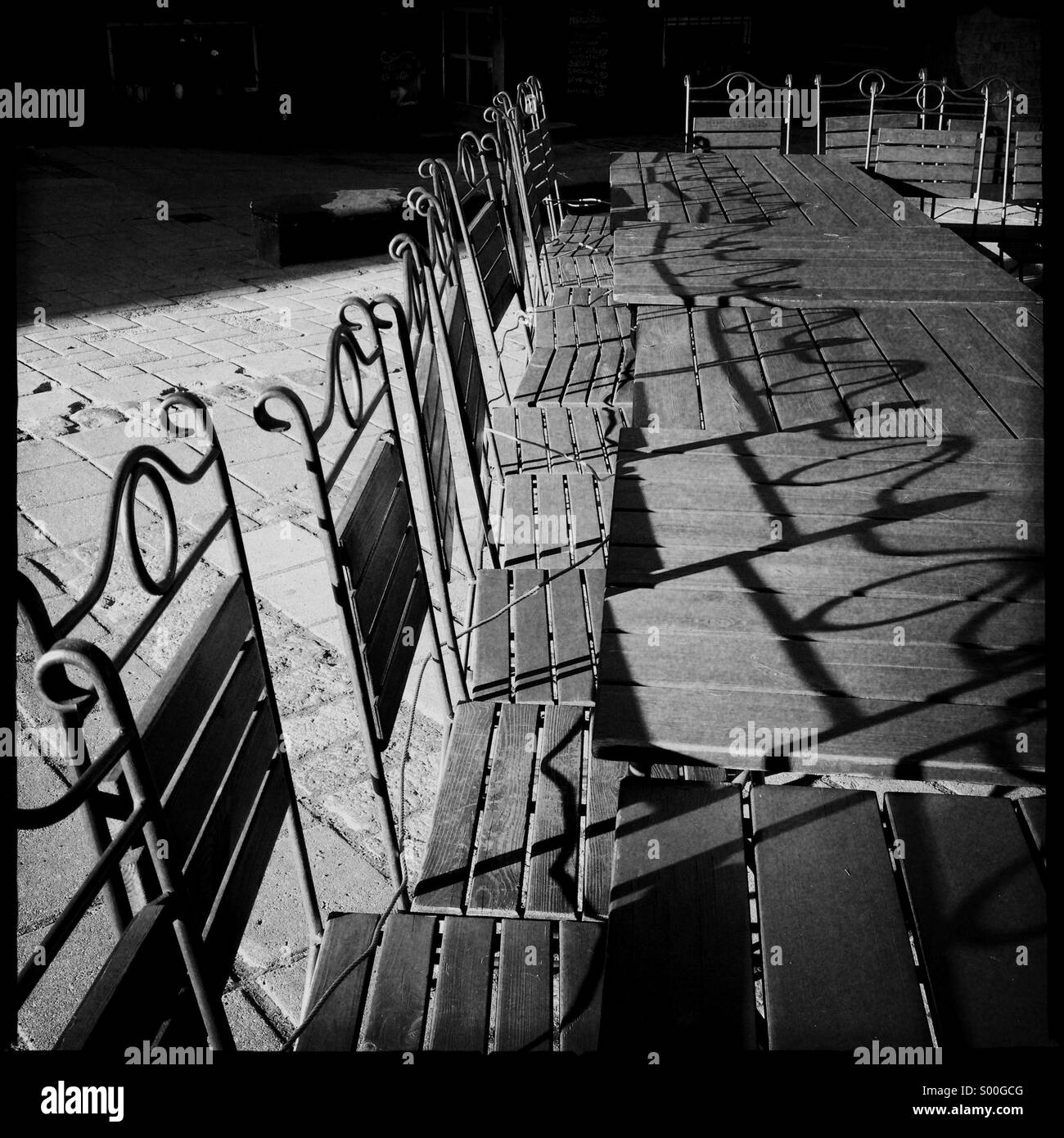 Row of wooden seats Black and White Stock Photos & Images - Alamy