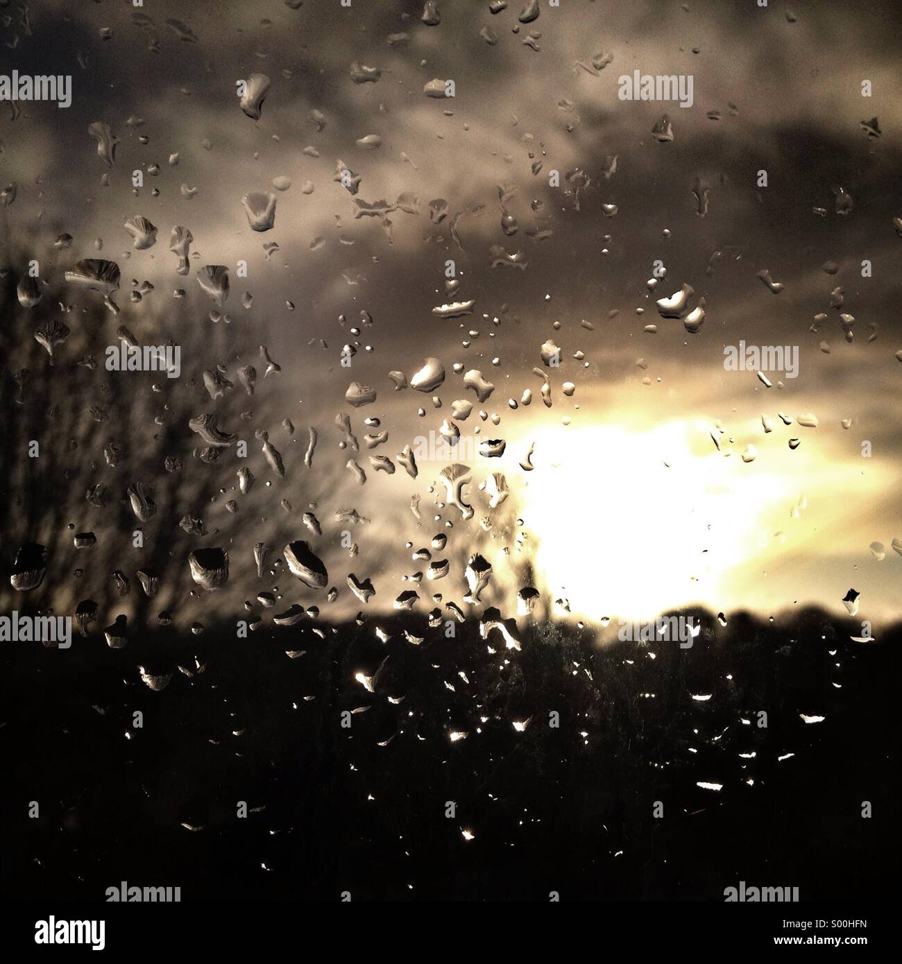 Rain and sun Stock Photo - Alamy