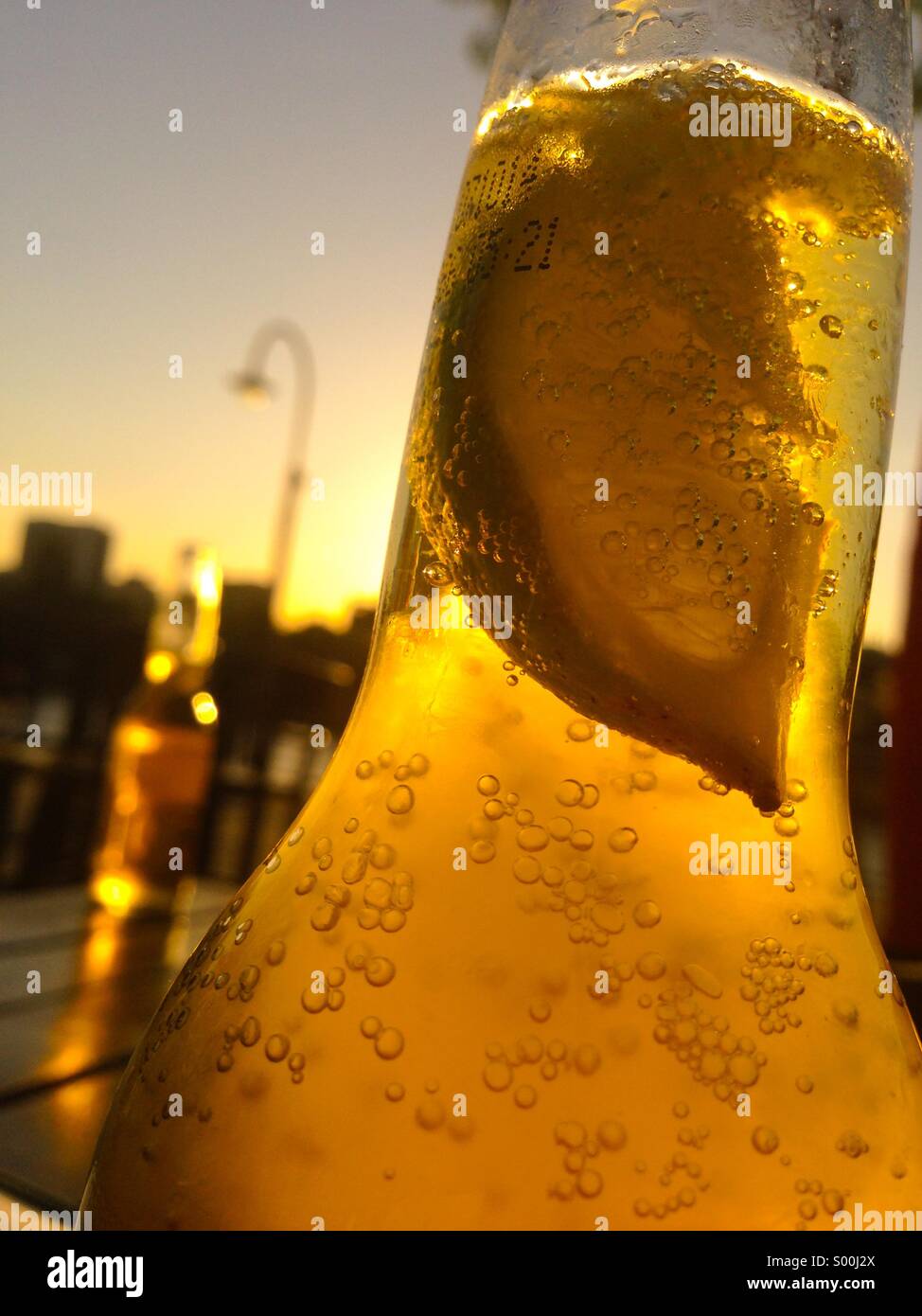 Beer at Sunset Stock Photo - Alamy