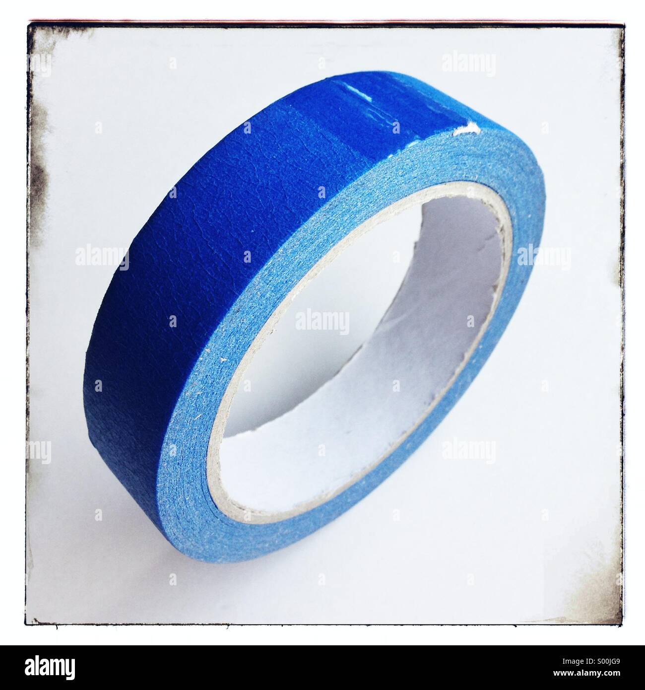 A roll of blue sticky tape Stock Photo - Alamy