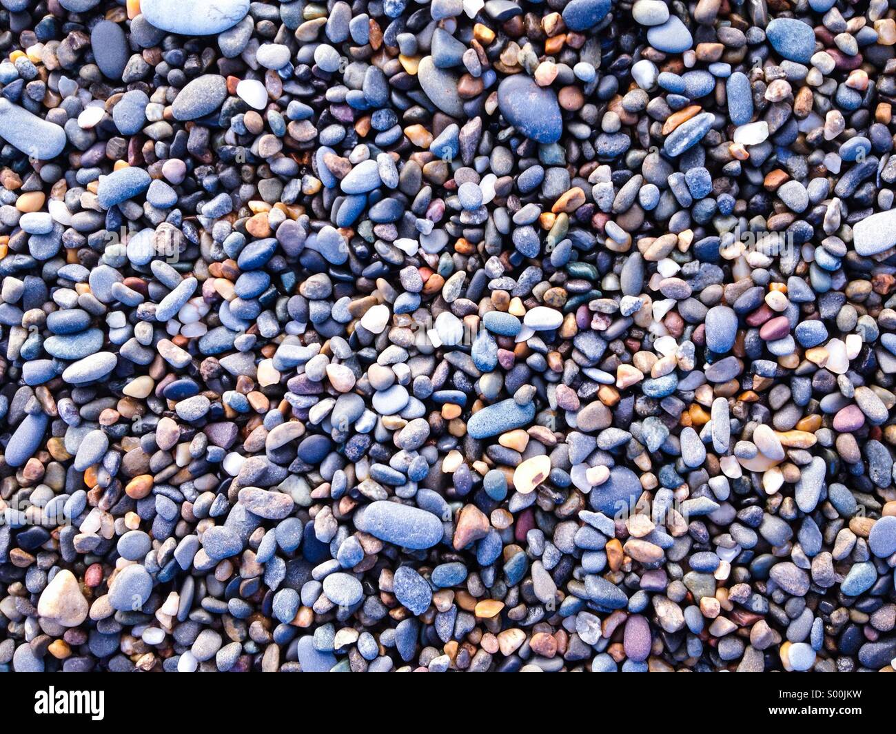 Pebbles on a beach Stock Photo - Alamy