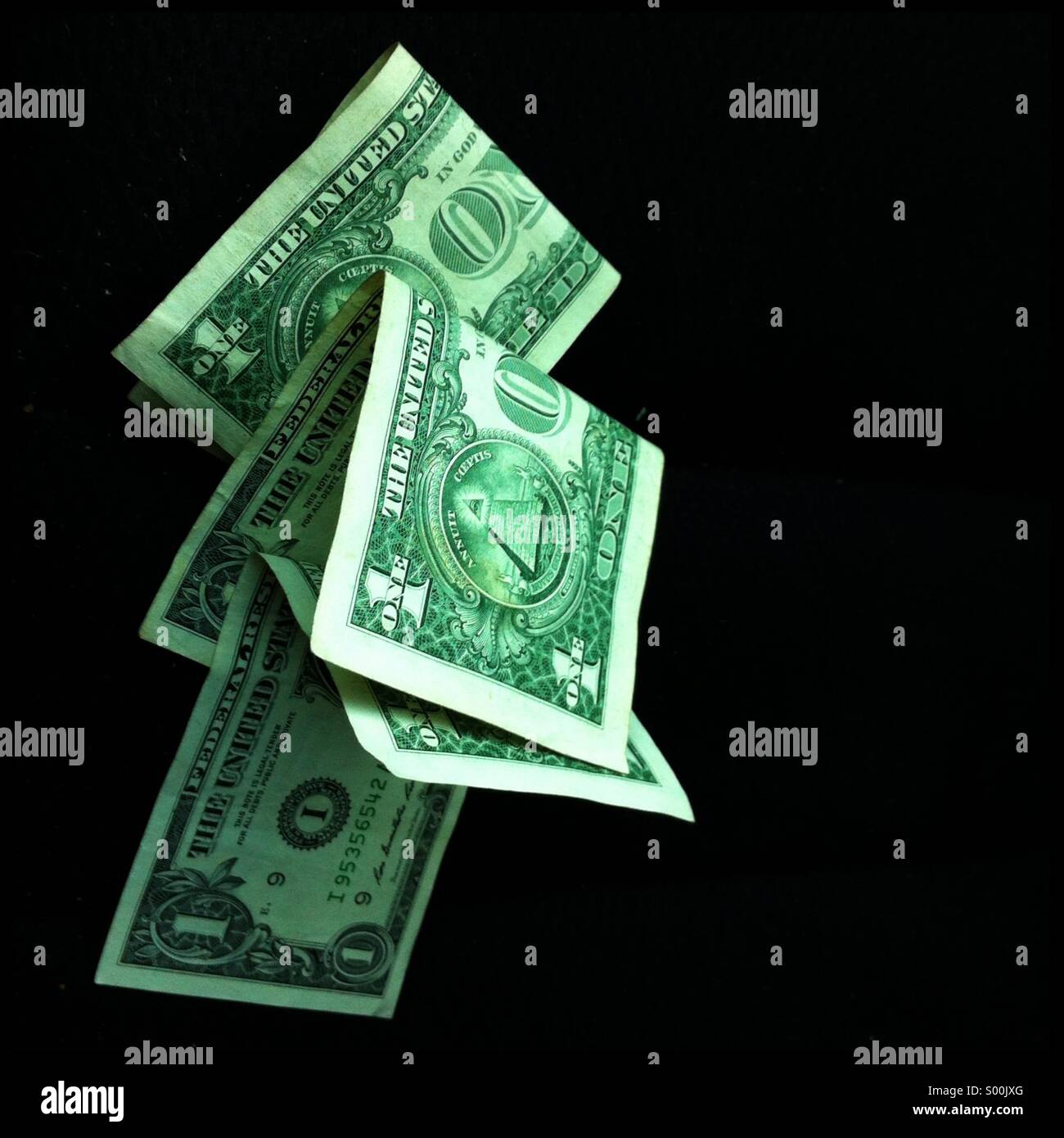 Three US dollars Stock Photo - Alamy