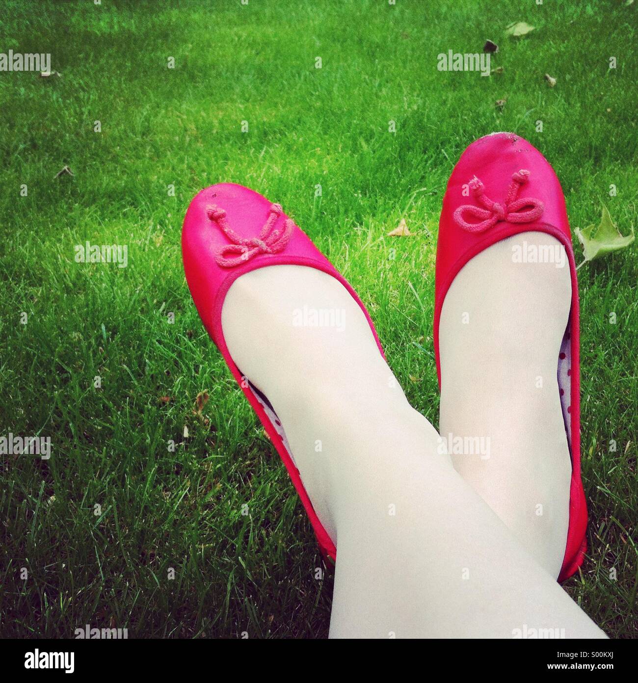 Crossed feet hi-res stock photography and images - Alamy