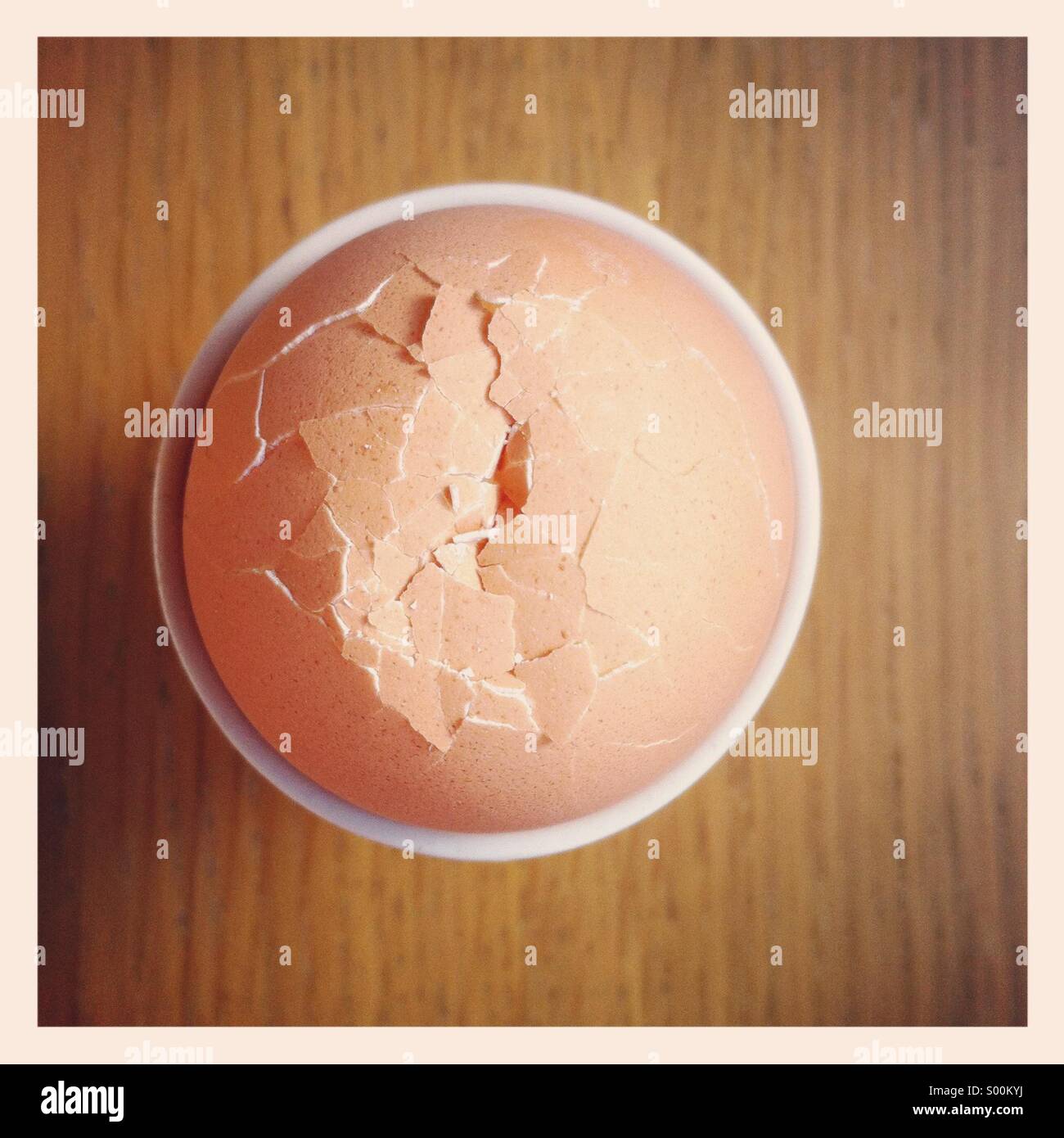 Cracked boiled egg viewed from above Stock Photo - Alamy