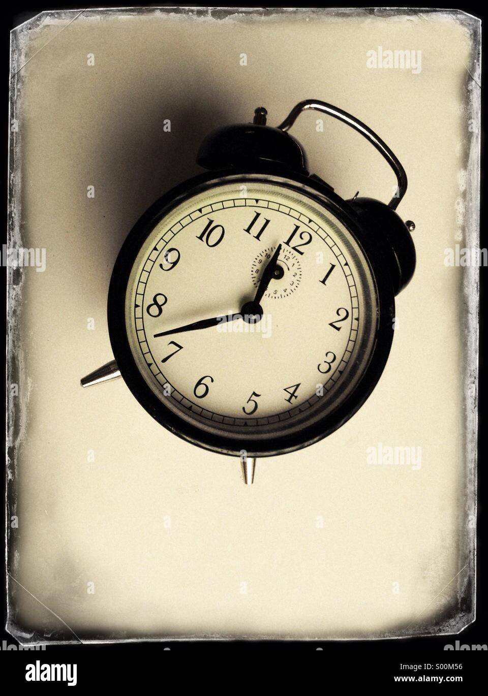 Vintage alarm clock Stock Photo - Alamy