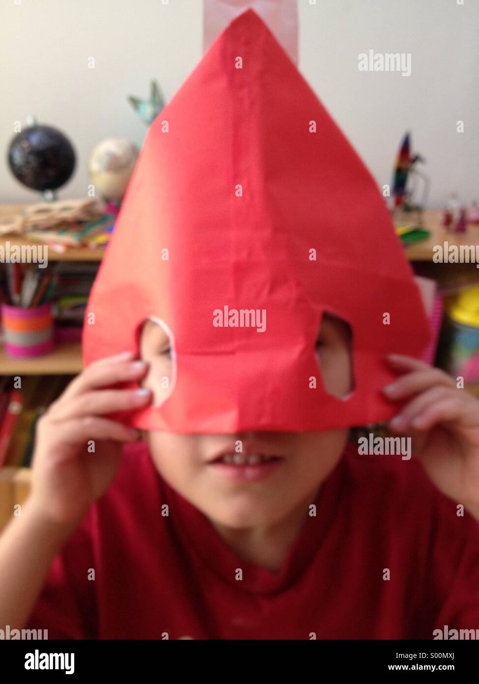 Child red mask Stock Photo - Alamy