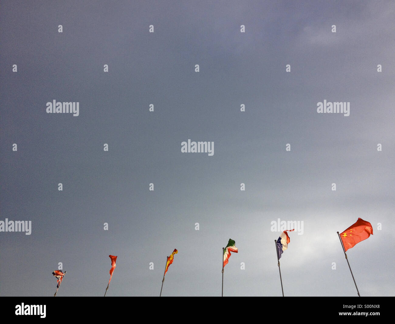 Flags and sky Stock Photo - Alamy