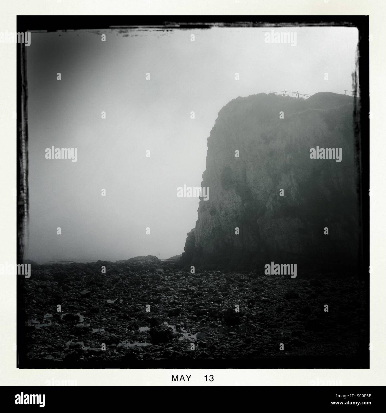 Low tide and sea mist at freshwater bay Stock Photo - Alamy