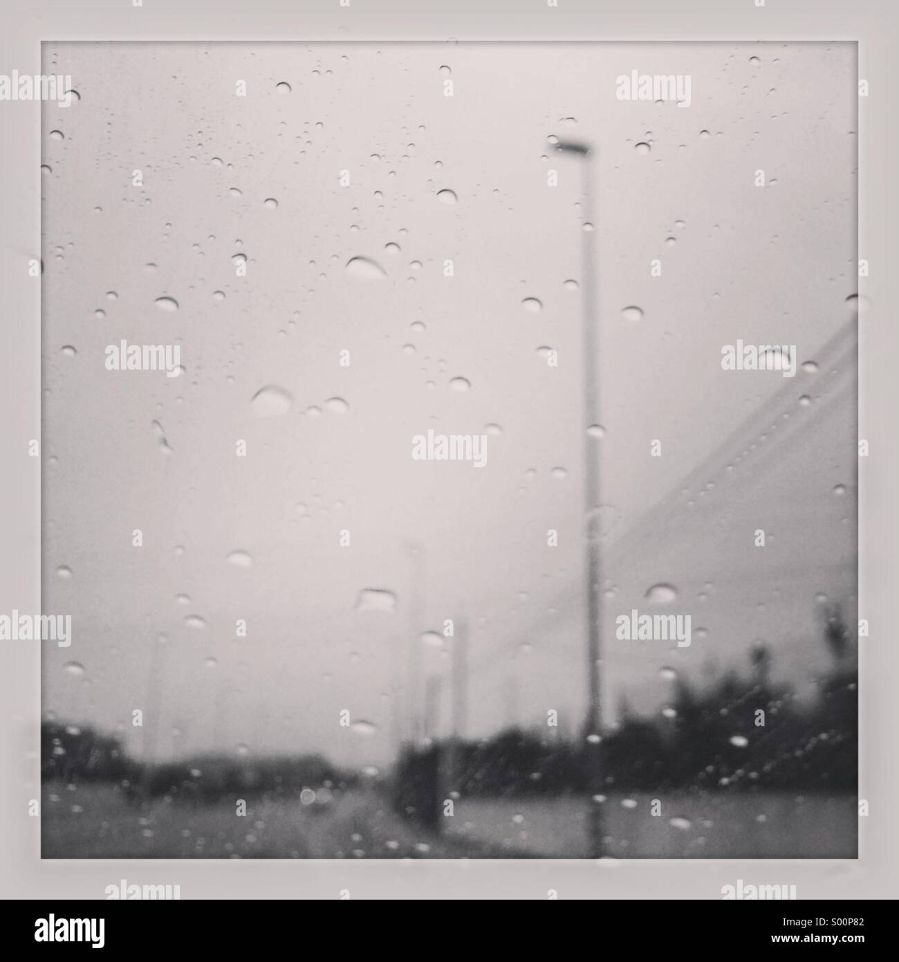 The rain on the car window Stock Photo - Alamy
