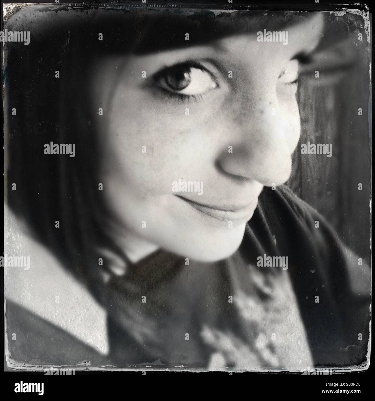 Coy smile hi-res stock photography and images - Alamy