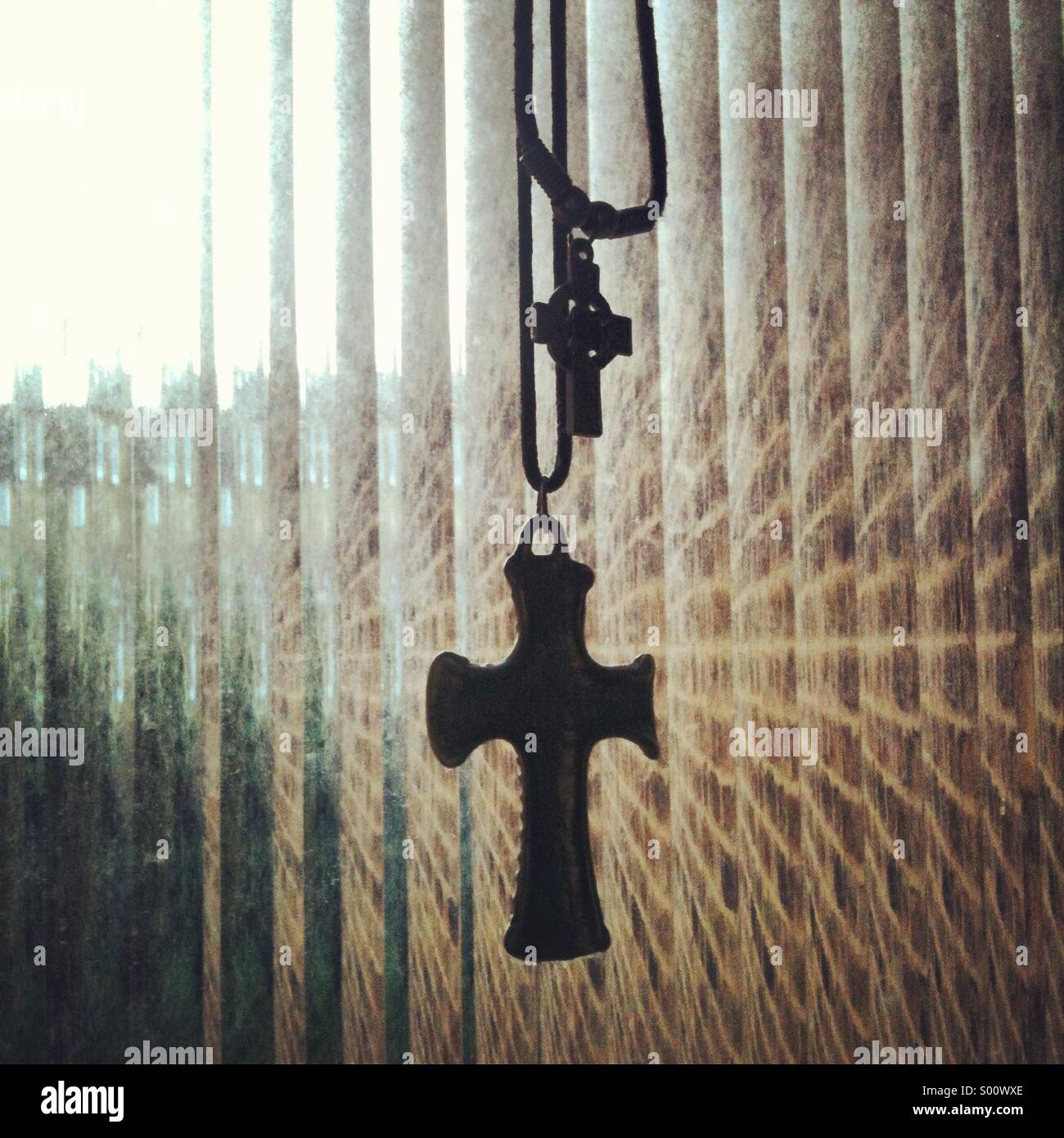 Crosses on window Stock Photo - Alamy