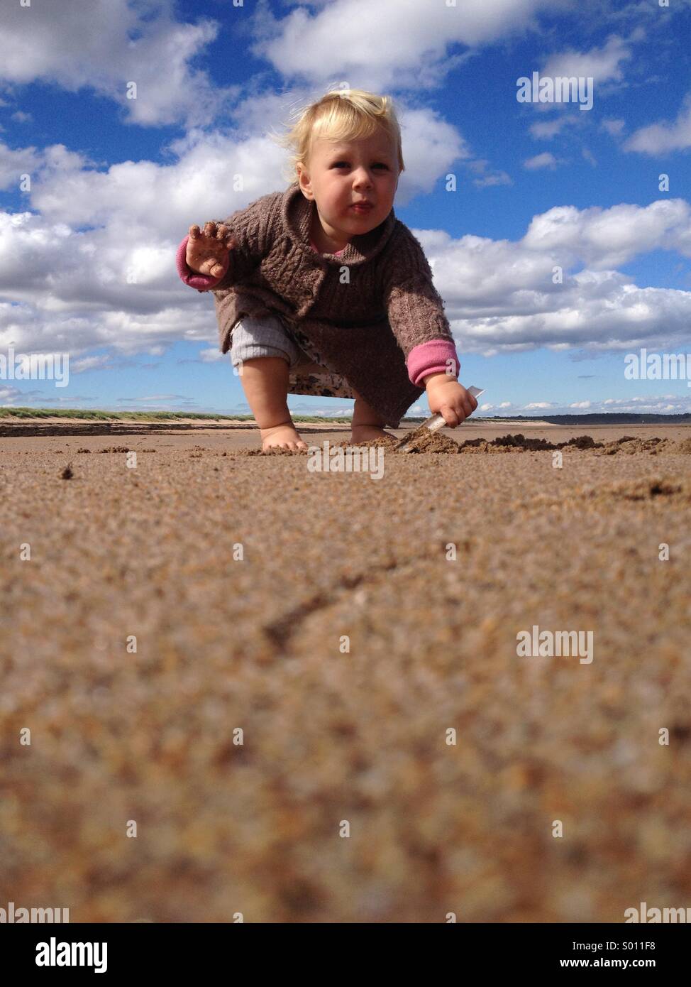 Girl crouching barefoot hi-res stock photography and images - Alamy