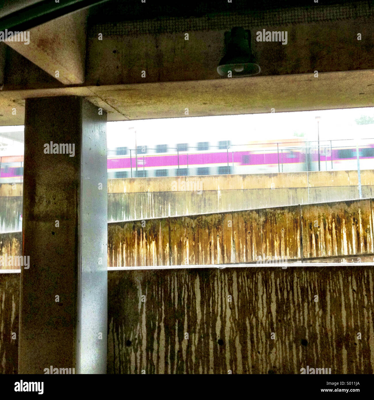 Train station in the rain Stock Photo - Alamy