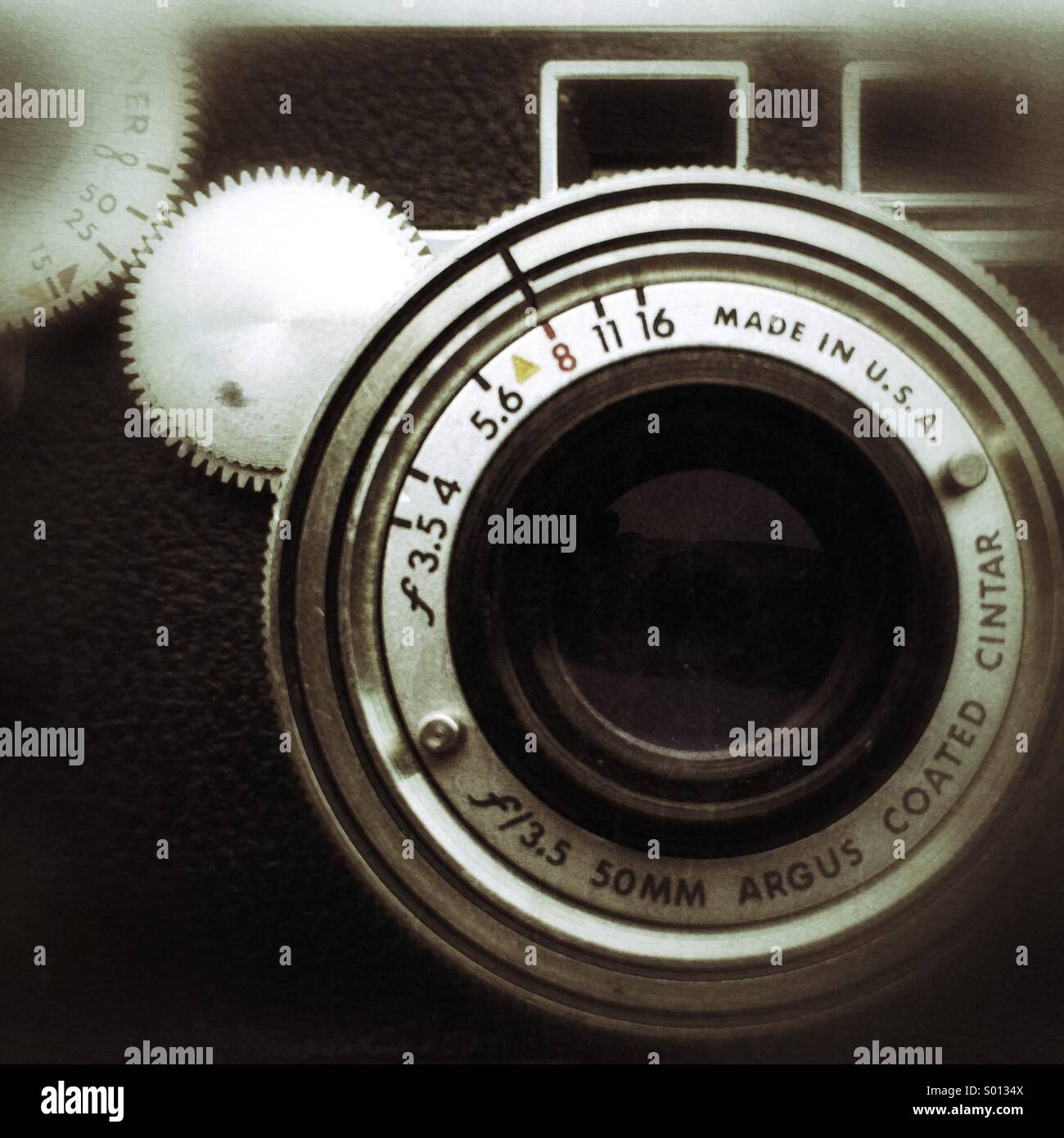 A front view of the lens and controls of a vintage Argus C3 rangefinder ...