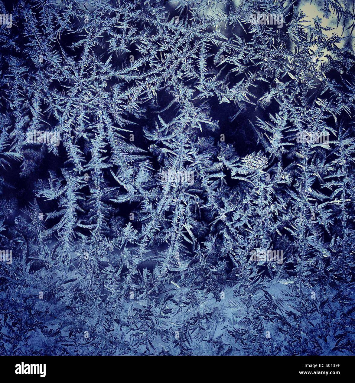 Frosty winter scene painted on a window Stock Photo - Alamy