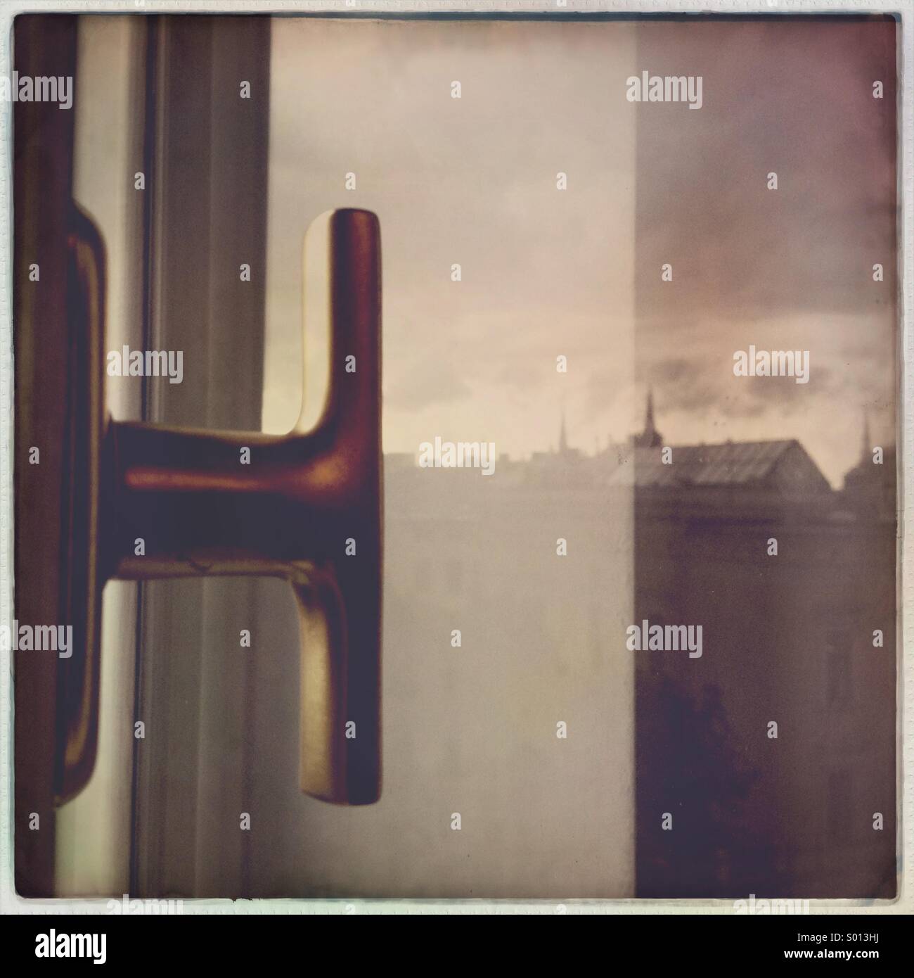Evening city through the window of a house. Riga. Latvia Stock Photo ...