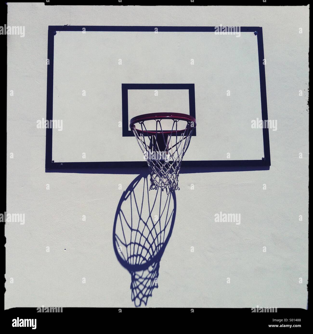 Shadow of a basketball ring Stock Photo - Alamy
