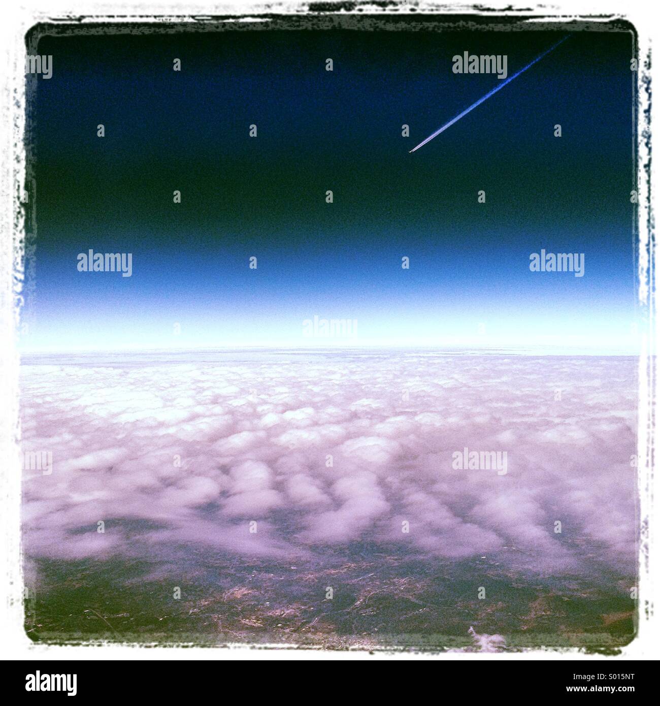 Cloud pattern from the air with navy blue sky Stock Photo - Alamy