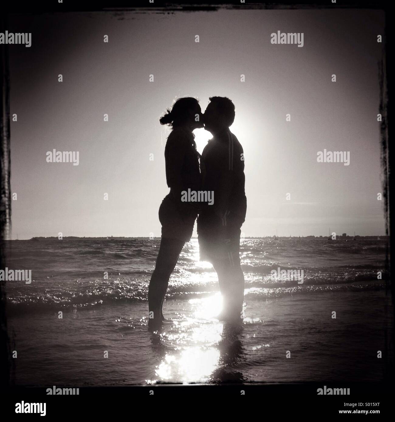 Kiss at sunset hi-res stock photography and images - Alamy