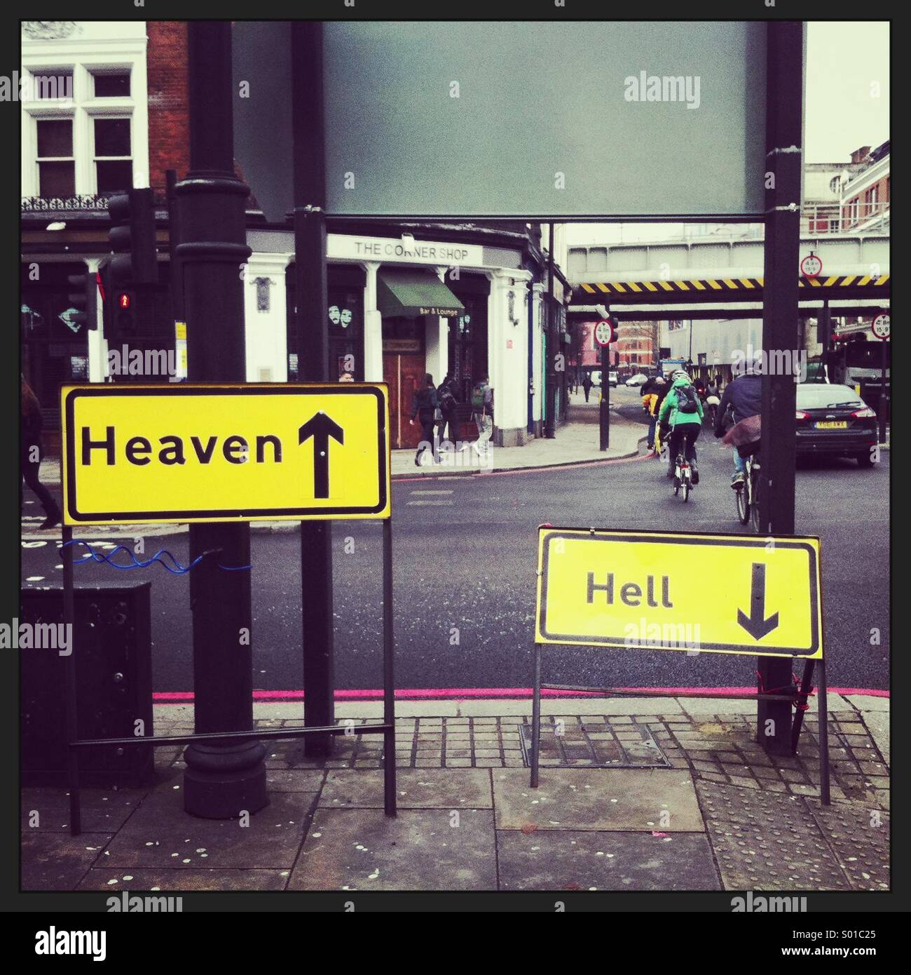 Heaven and hell street sign art in Shoreditch Stock Photo - Alamy