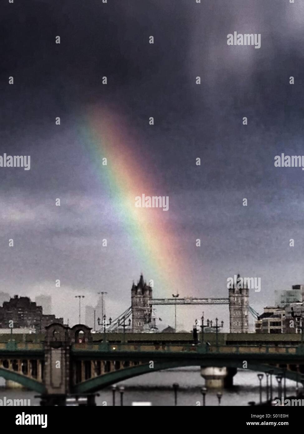 A rainbow appears over Tower Bridge in London Stock Photo - Alamy