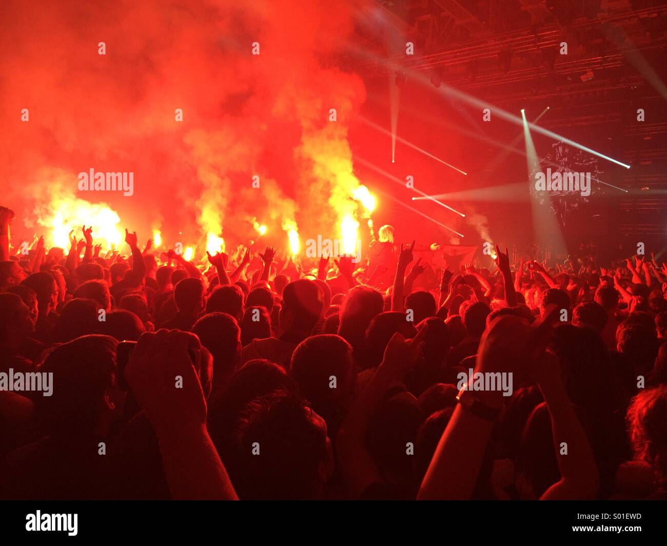 Flares at the concert of rock band Stock Photo - Alamy