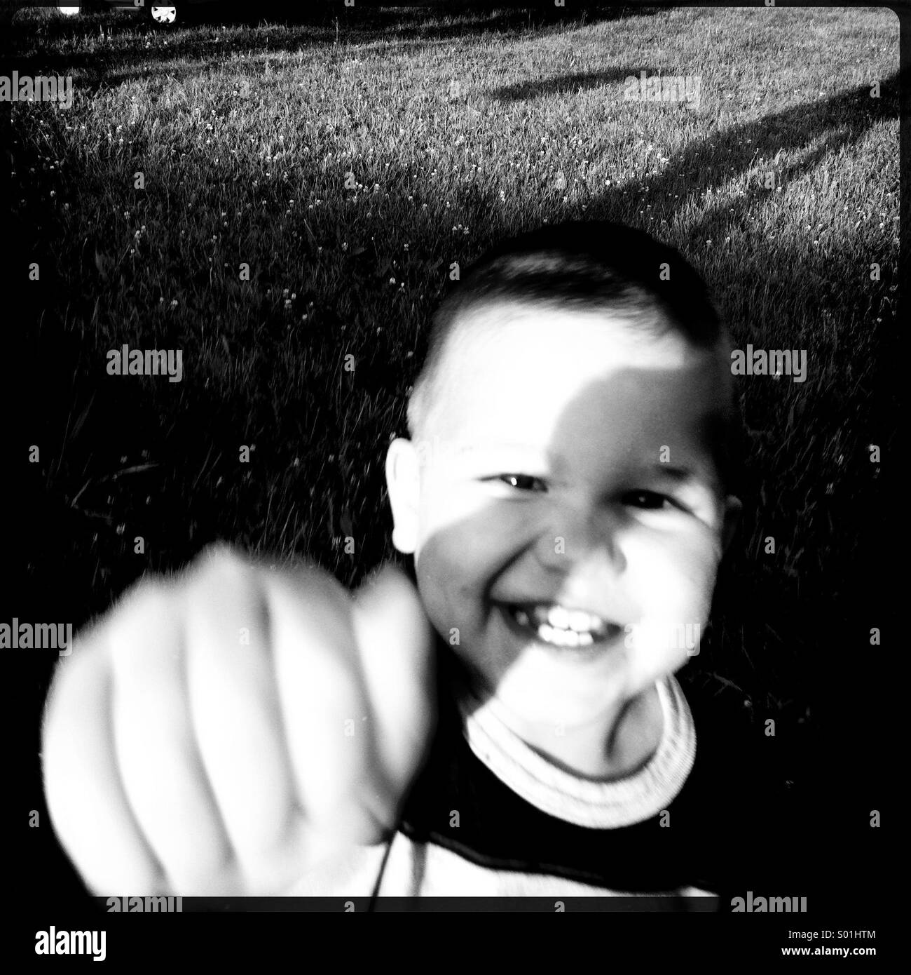 Child grabbing at camera hi-res stock photography and images - Alamy