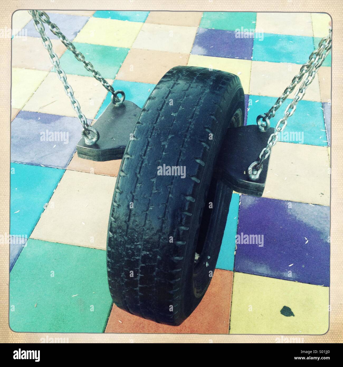 Wheel swing on playground Stock Photo - Alamy