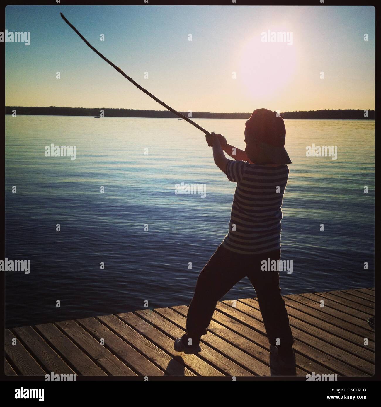 Boy stick fighting hi-res stock photography and images - Alamy