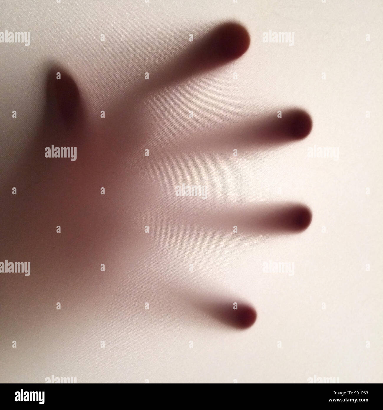 Hand behind glass hi-res stock photography and images - Alamy