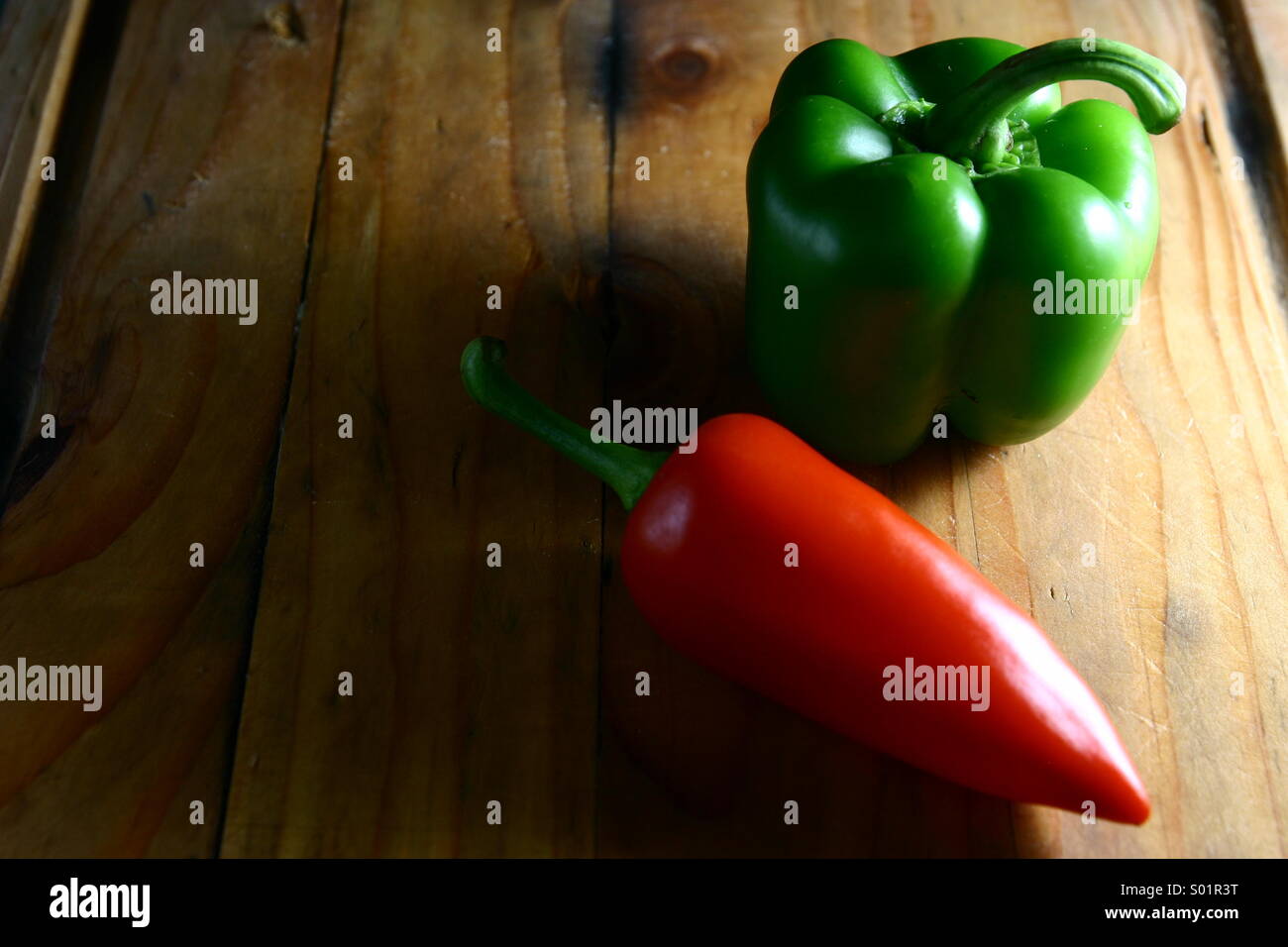Red and green bell pepper Stock Photo - Alamy